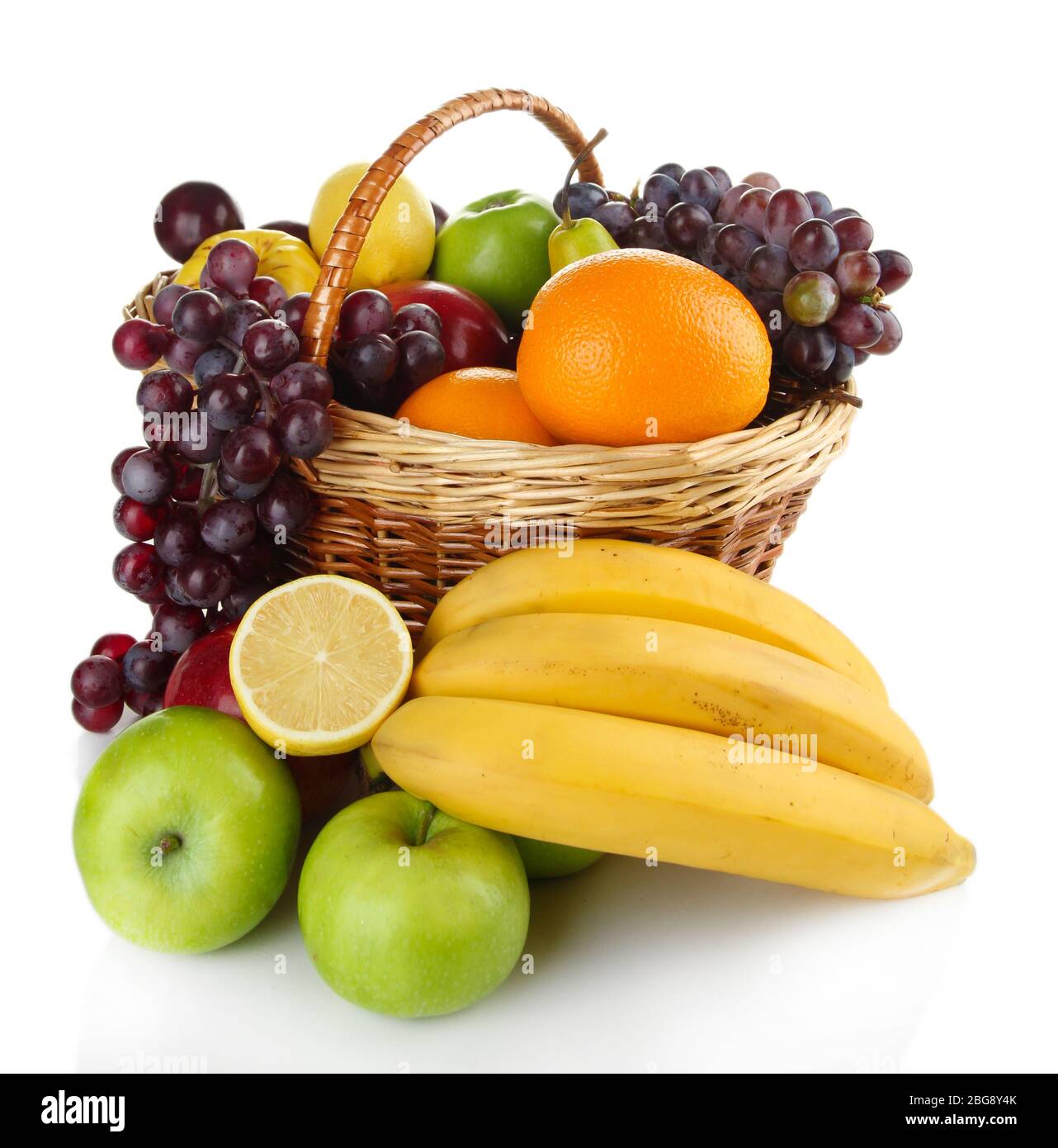 Composition of different fruits with basket isolated on white Stock ...