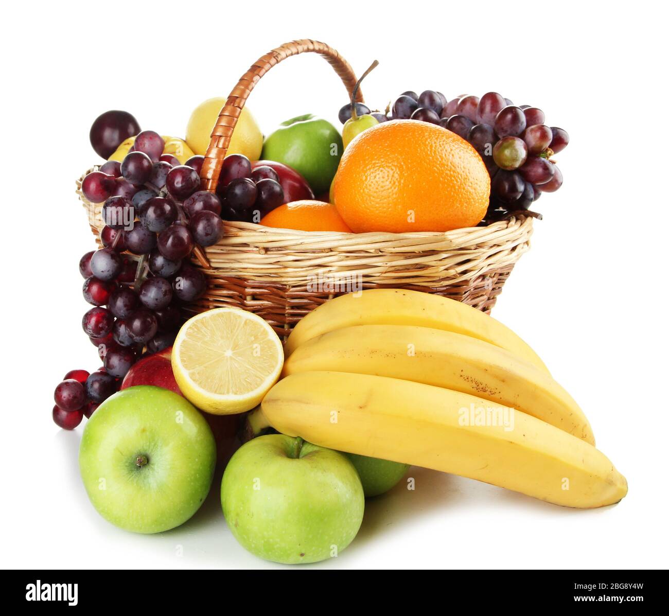 Composition of different fruits with basket isolated on white Stock ...