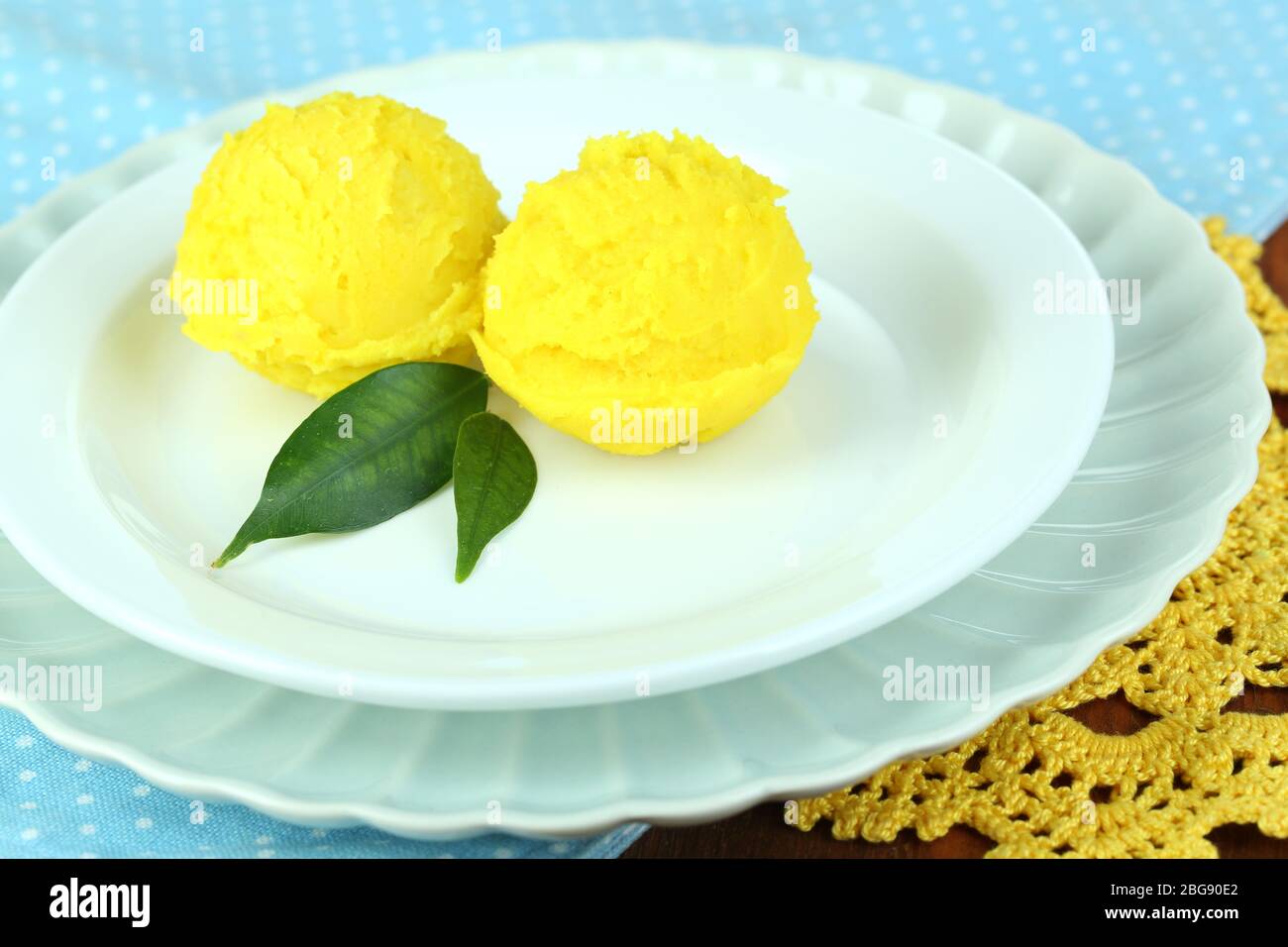 Delicious ice cream on plate on table close-up Stock Photo - Alamy