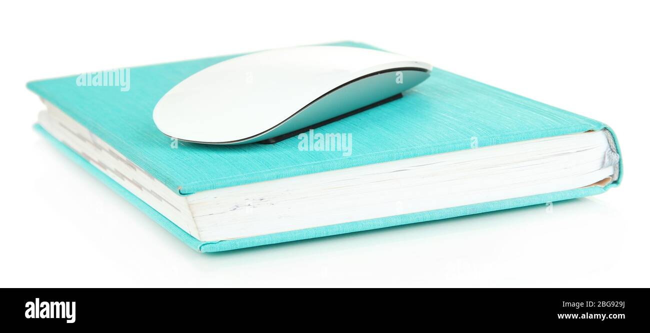 Computer mouse on book isolated on white Stock Photo - Alamy