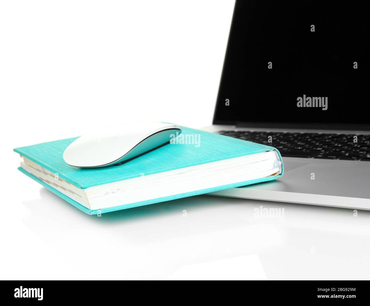 Computer mouse on book and notebook isolated on white Stock Photo - Alamy