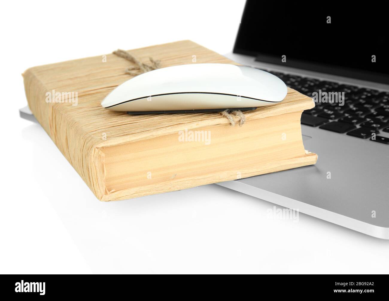 Computer mouse on book and notebook isolated on white Stock Photo - Alamy