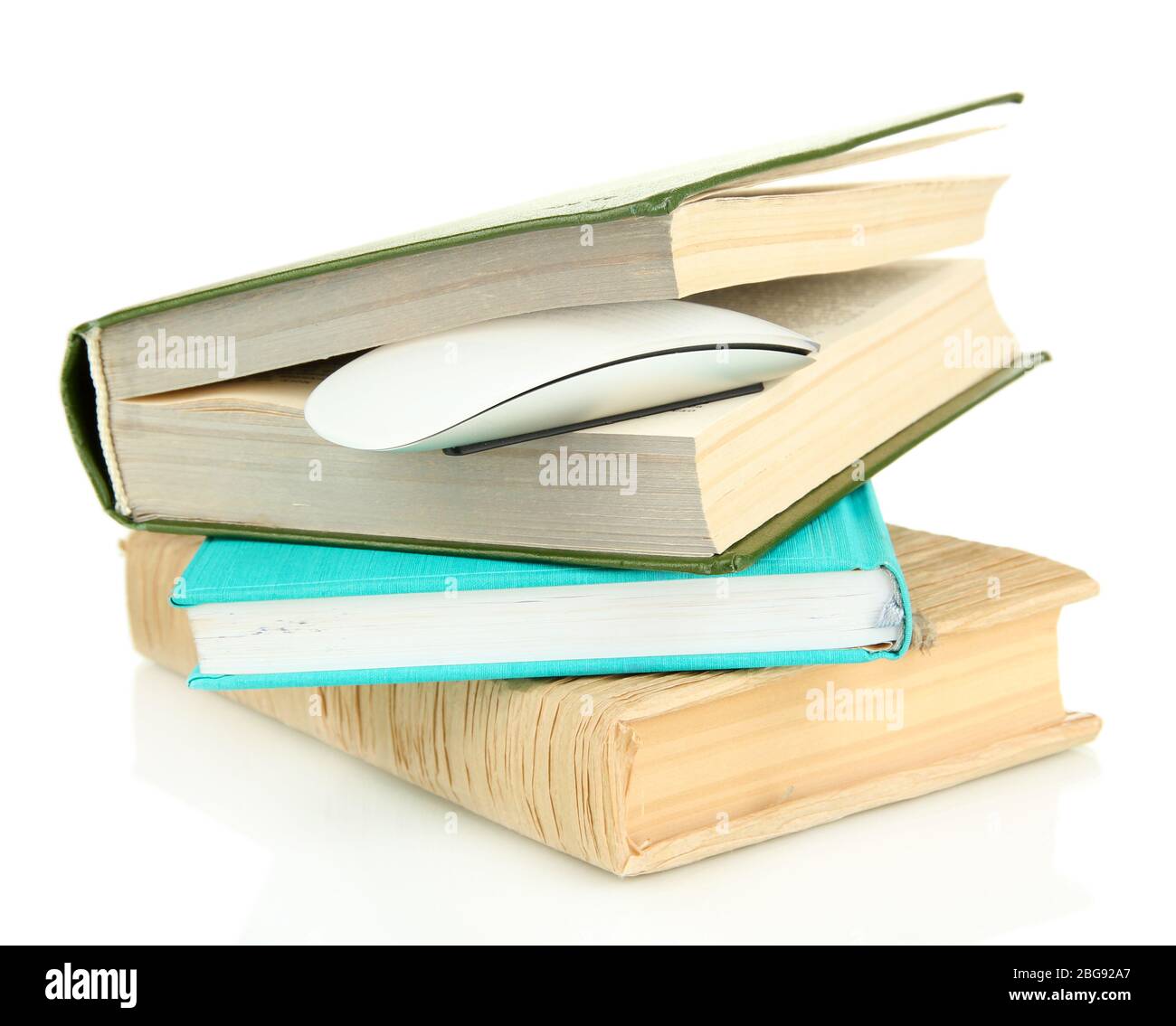 Computer mouse on books isolated on white Stock Photo - Alamy