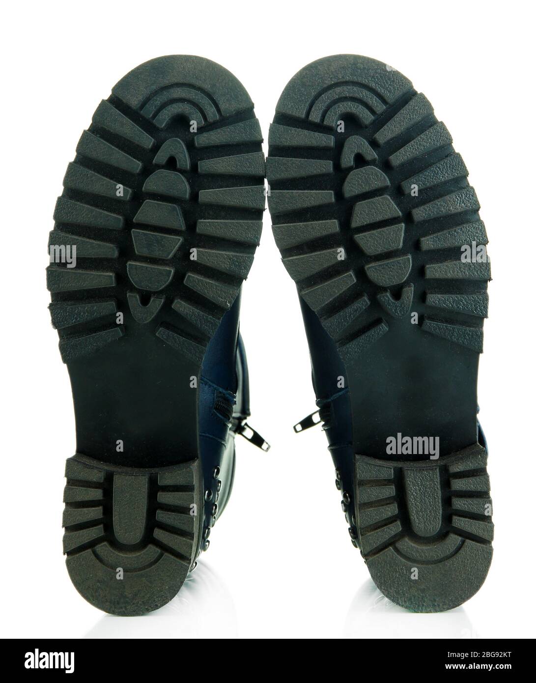 Soles of boots isolated on white Stock Photo - Alamy