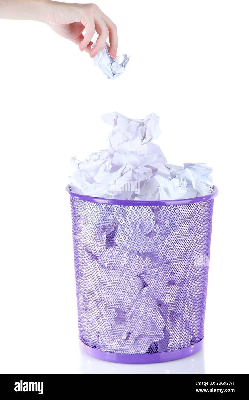 Recycle bin filled with crumpled papers, isolated on white Stock Photo ...