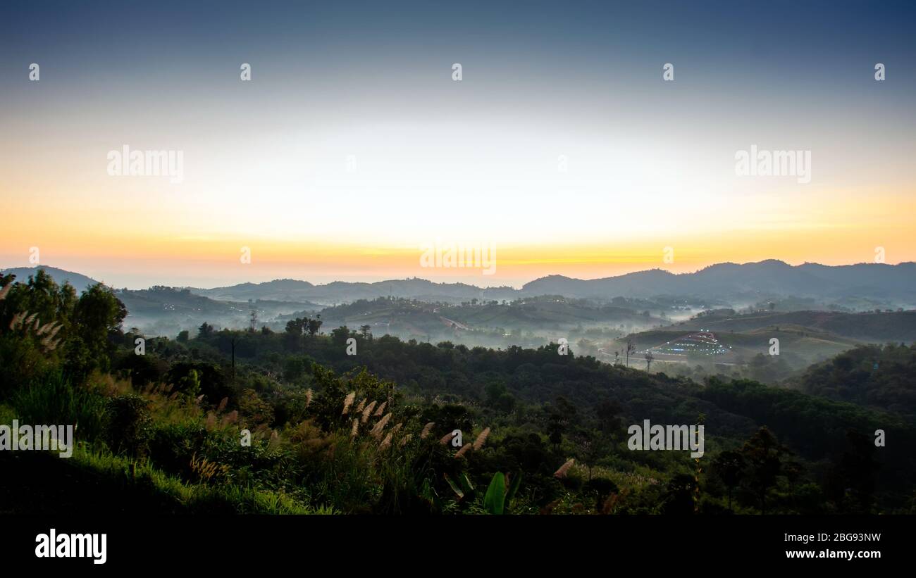 beautiful sunrise on horizontal line of landscape mountain for waking ...