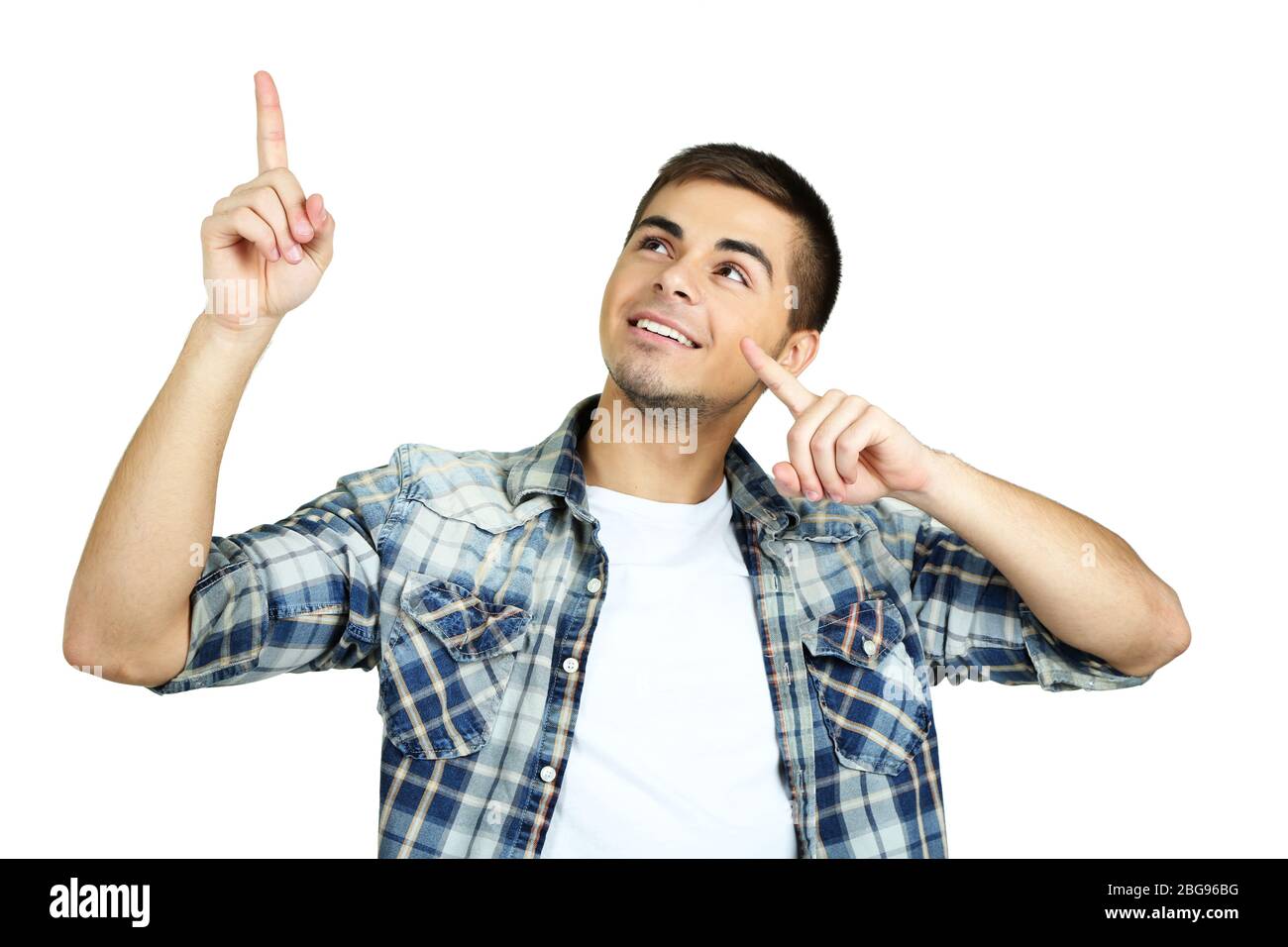 Portrait of young man on grey background Stock Photo - Alamy