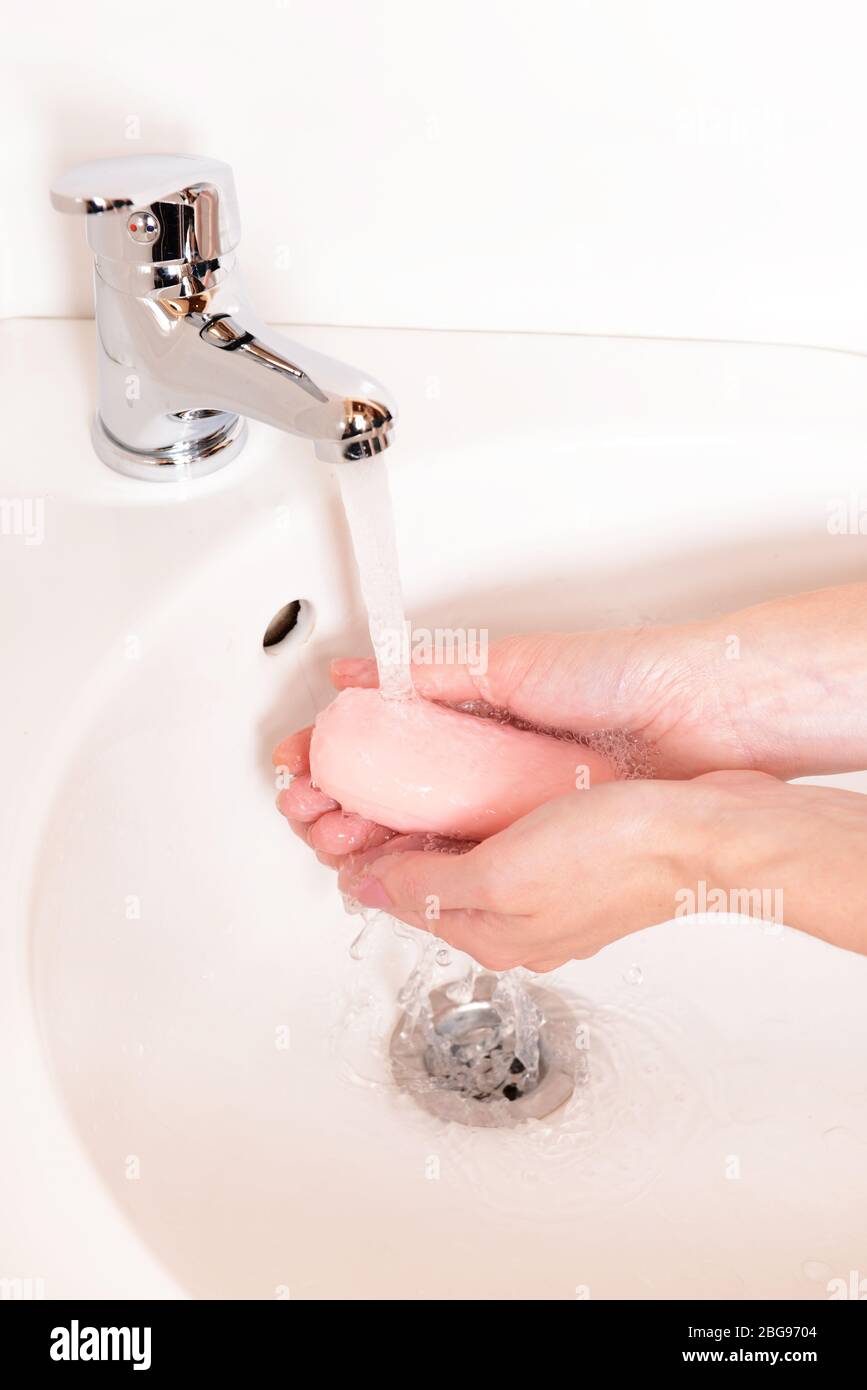 Hands being washed hi-res stock photography and images - Alamy