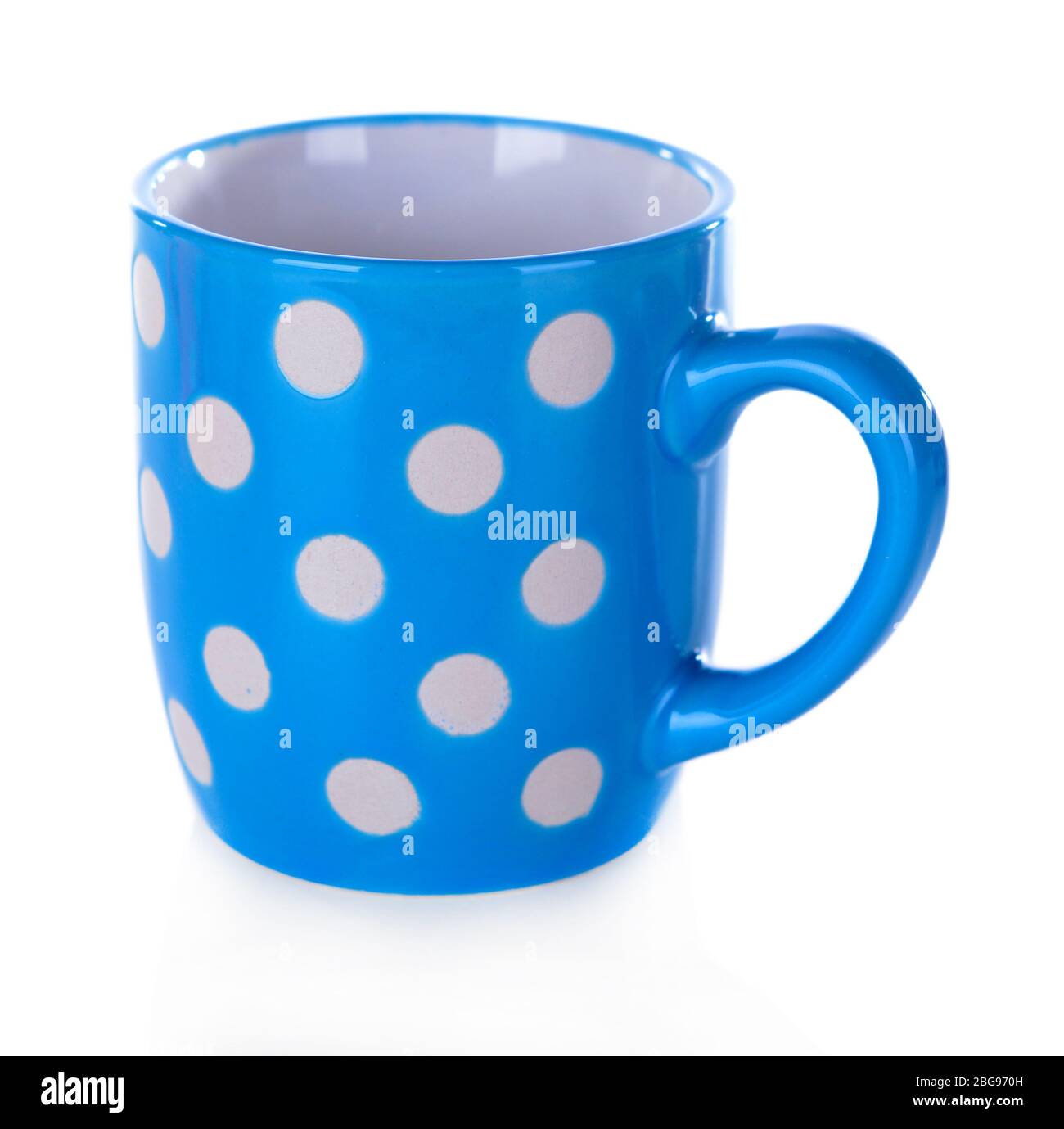 Color polka dot mug isolated on white Stock Photo - Alamy