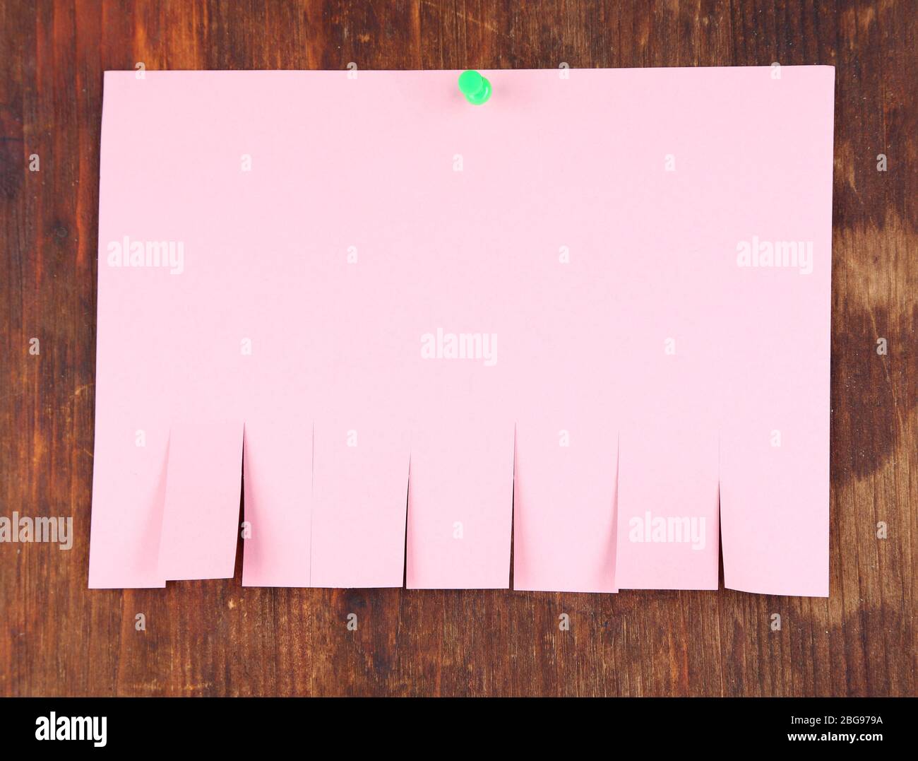 Paper ads on wooden background Stock Photo - Alamy