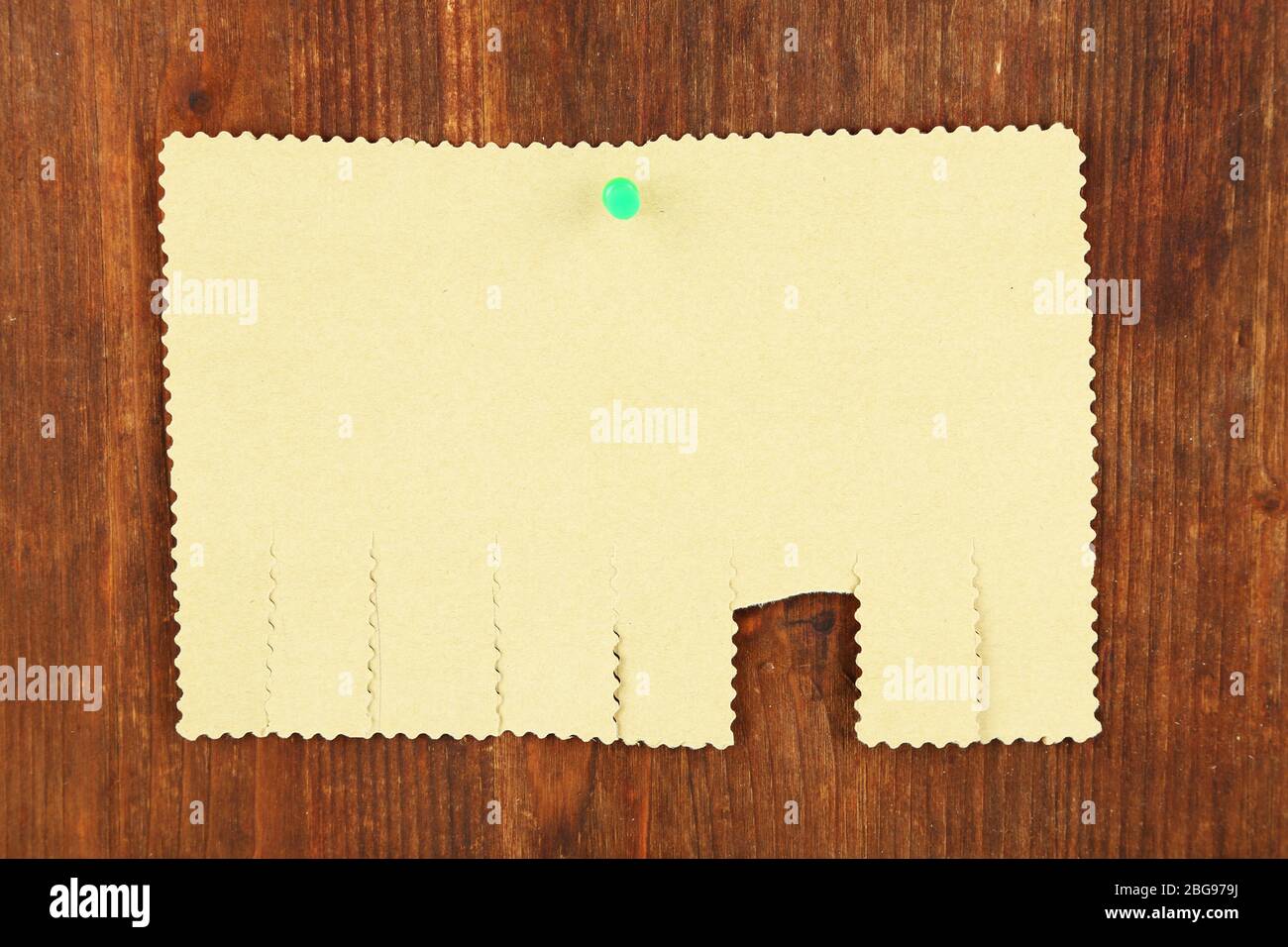 Paper ads on wooden background Stock Photo - Alamy