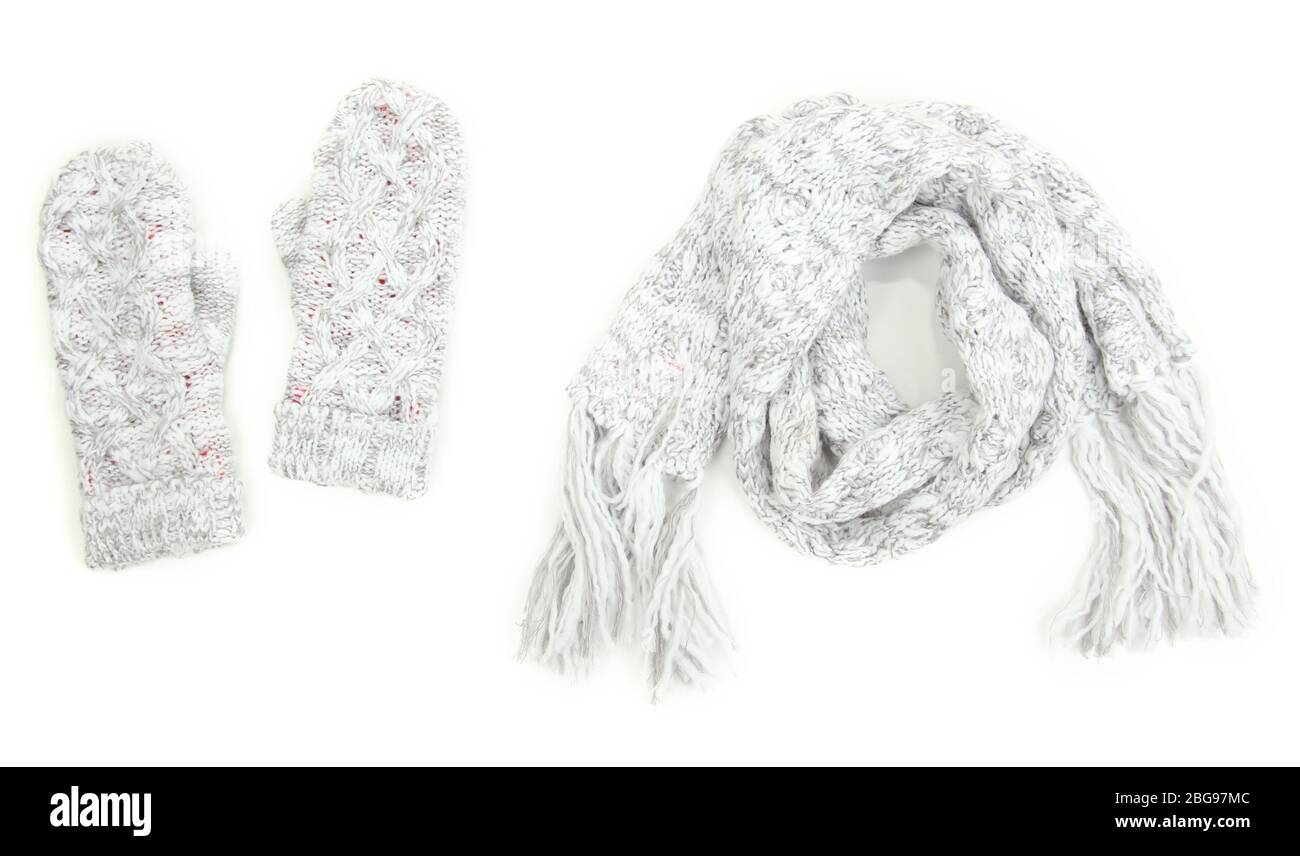 Warm knitted clothing isolated on white Stock Photo - Alamy