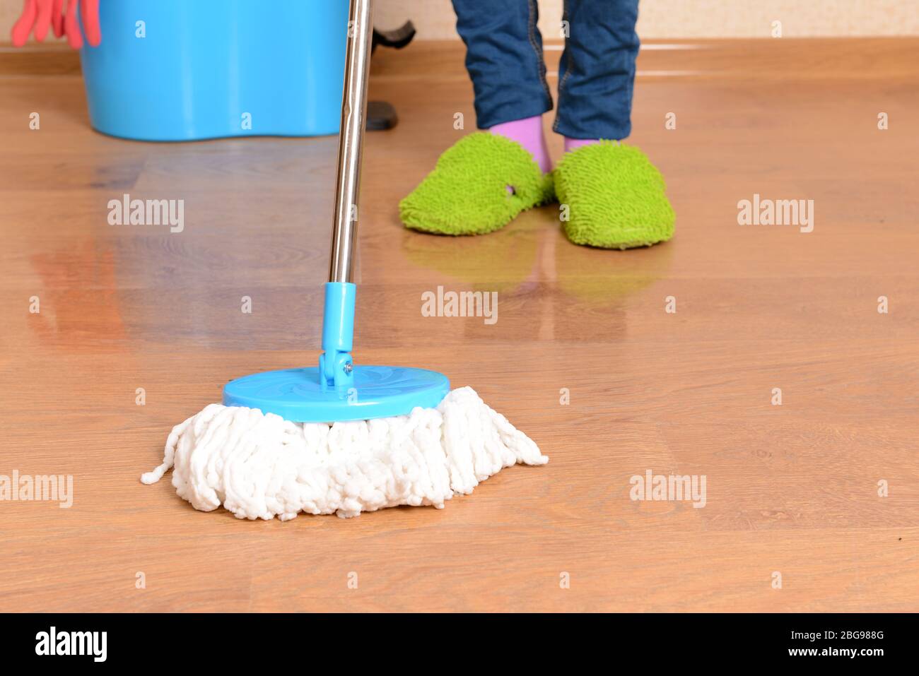 House cleaning with mop Stock Photo - Alamy