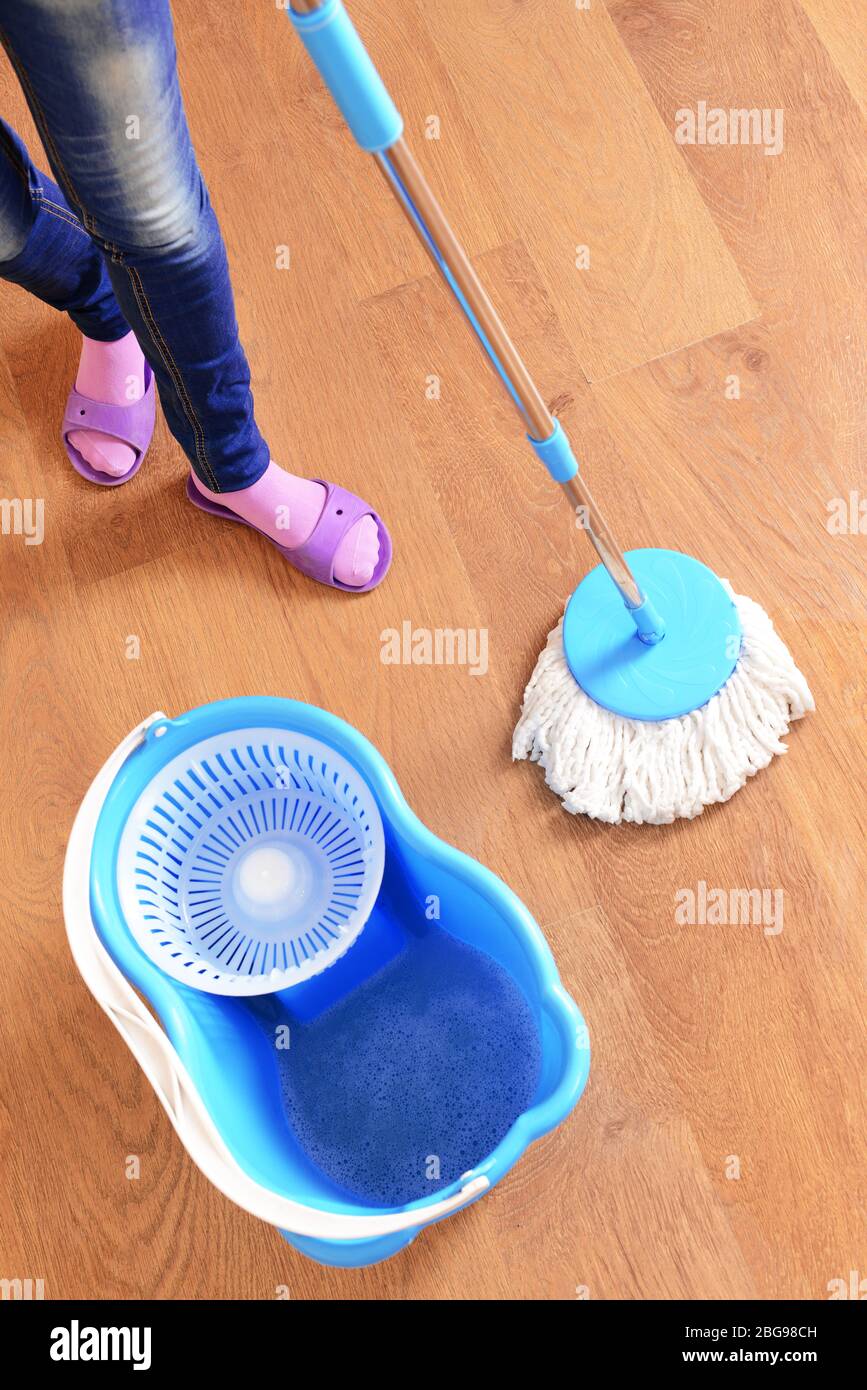 House cleaning with mop Stock Photo - Alamy