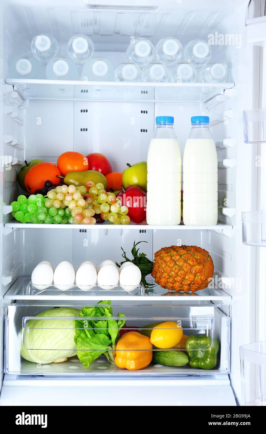 Refrigerator full of food Stock Photo - Alamy