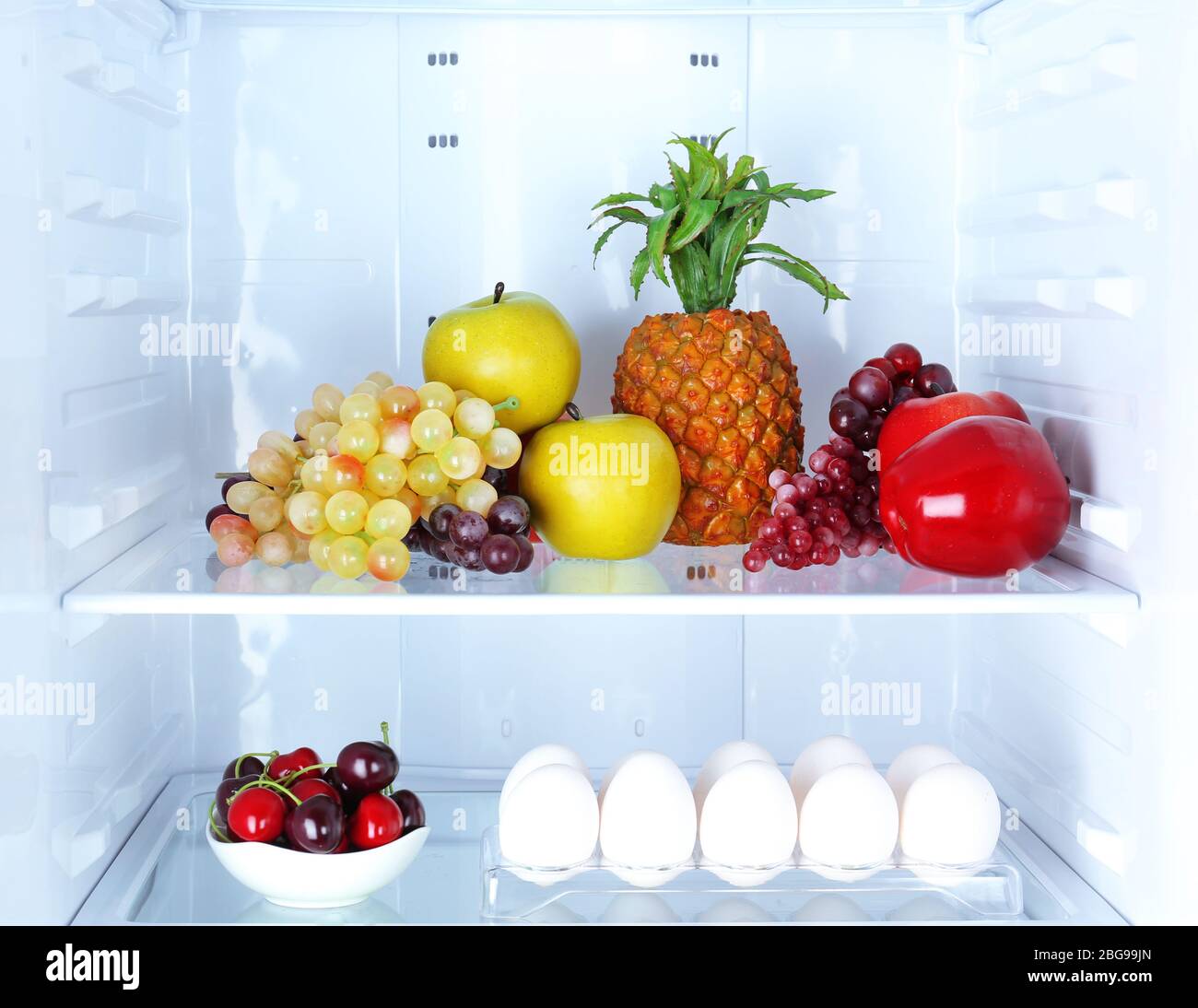 Refrigerator full of food Stock Photo - Alamy