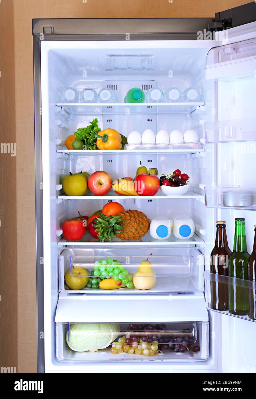 Refrigerator full of food Stock Photo - Alamy