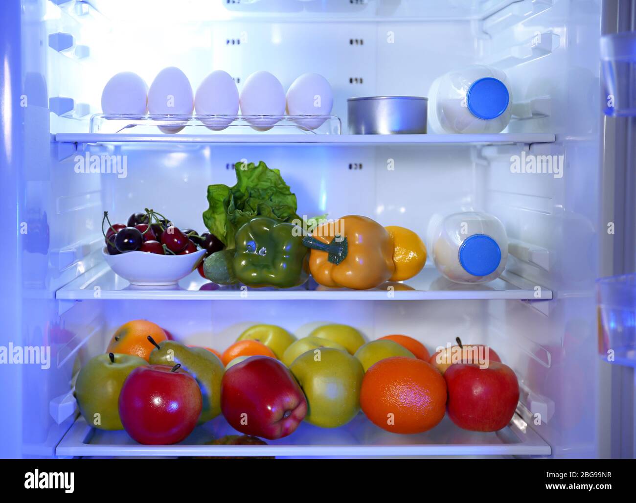 Refrigerator full of food Stock Photo - Alamy