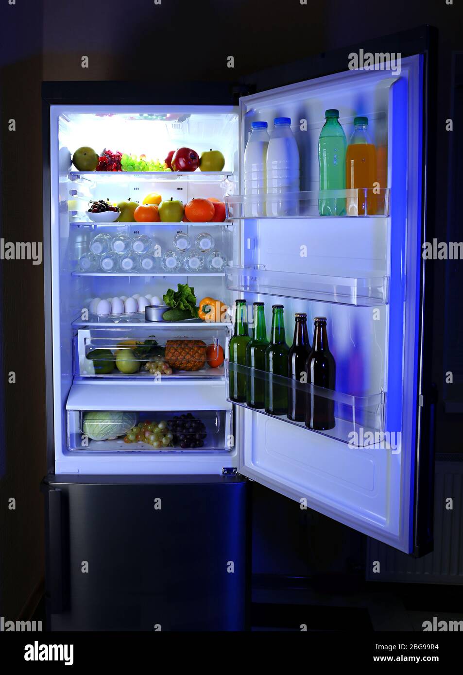 Refrigerator full of food Stock Photo - Alamy