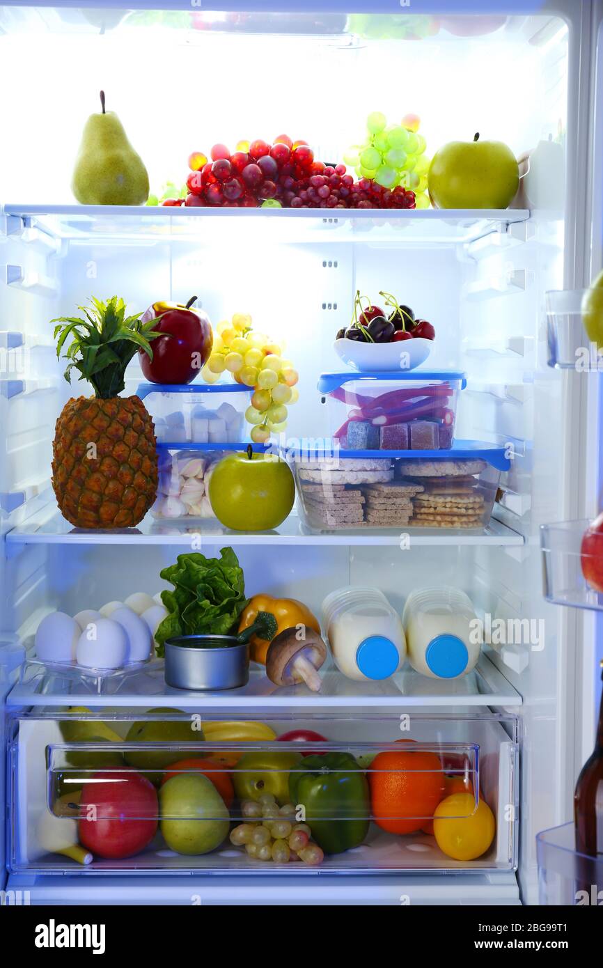 Refrigerator full of food Stock Photo - Alamy