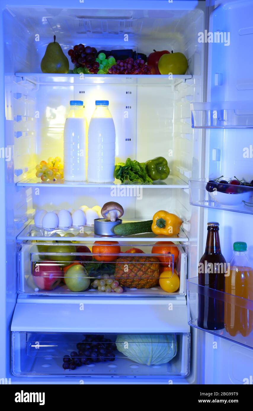 Refrigerator full milk eggs water hi-res stock photography and images ...