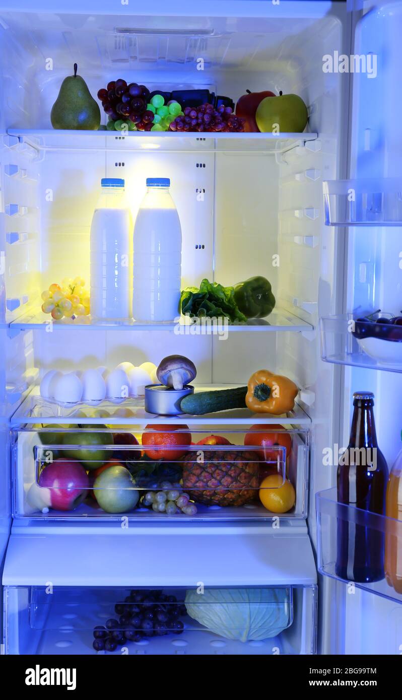 Refrigerator full of food Stock Photo - Alamy
