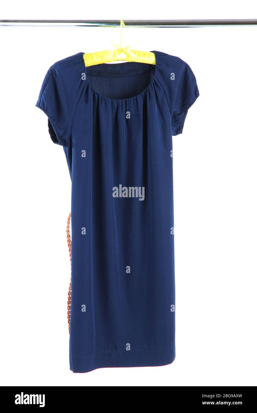 Beautiful blue dress hanging on hangers isolated on white Stock Photo ...