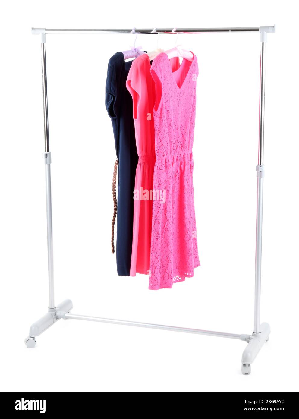 Beautiful dresses hanging on hangers isolated on white Stock Photo - Alamy