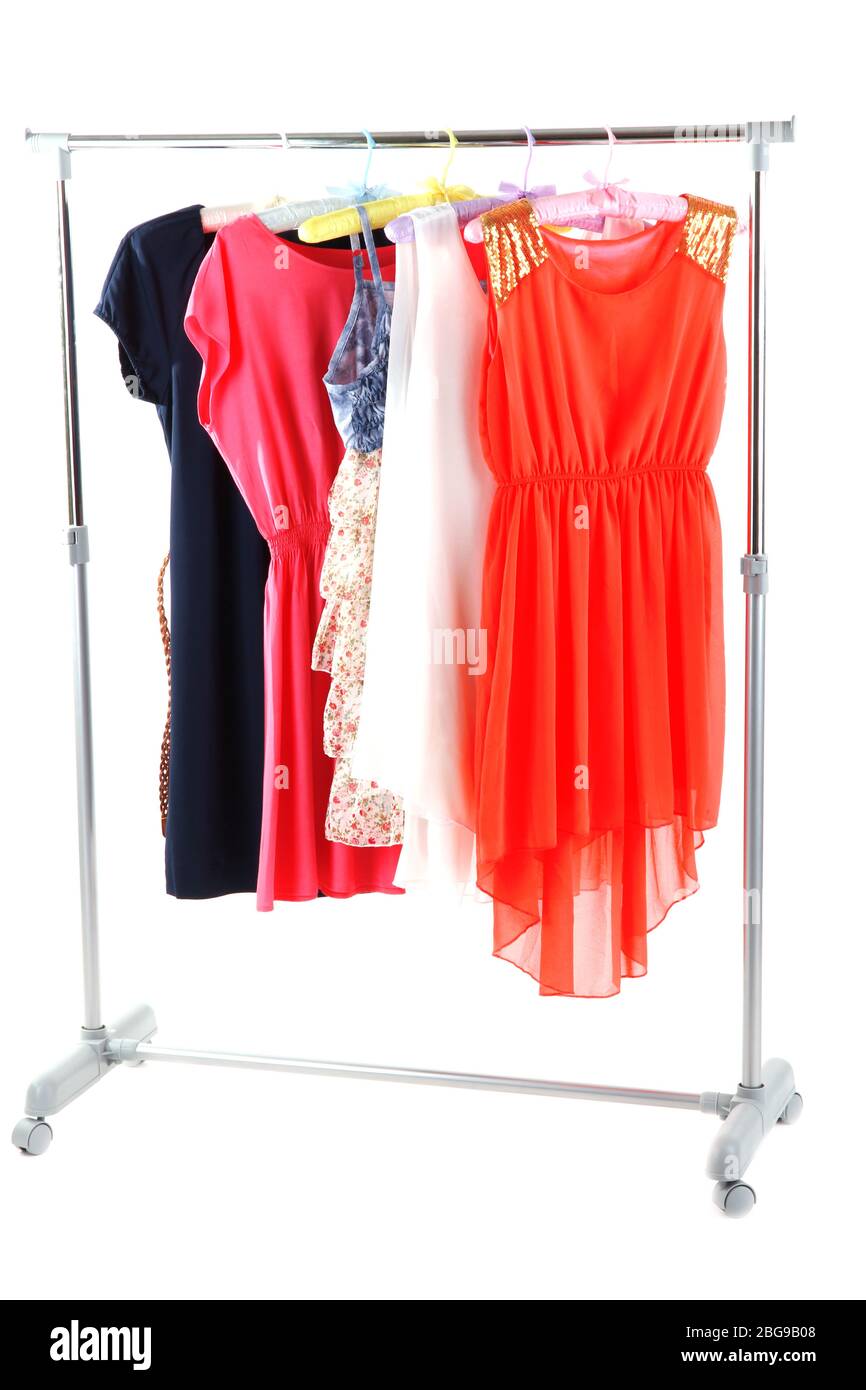Beautiful dresses hanging on hangers isolated on white Stock Photo - Alamy