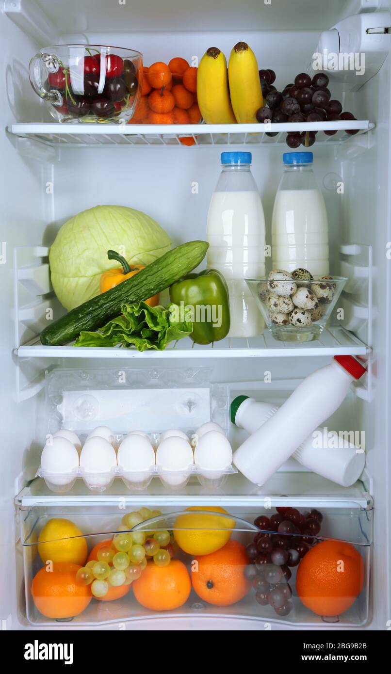 Refrigerator full of food Stock Photo - Alamy