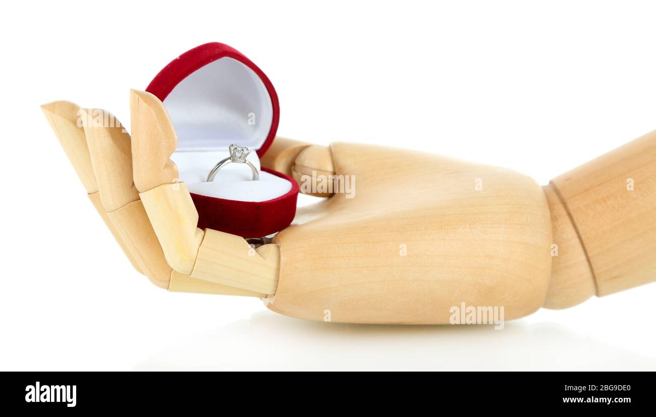 Box with ring in wooden hand isolated on white Stock Photo - Alamy