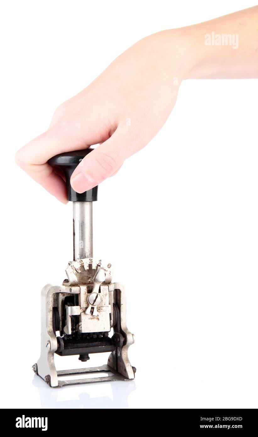 Hand with old metal stamp, isolated on white Stock Photo - Alamy