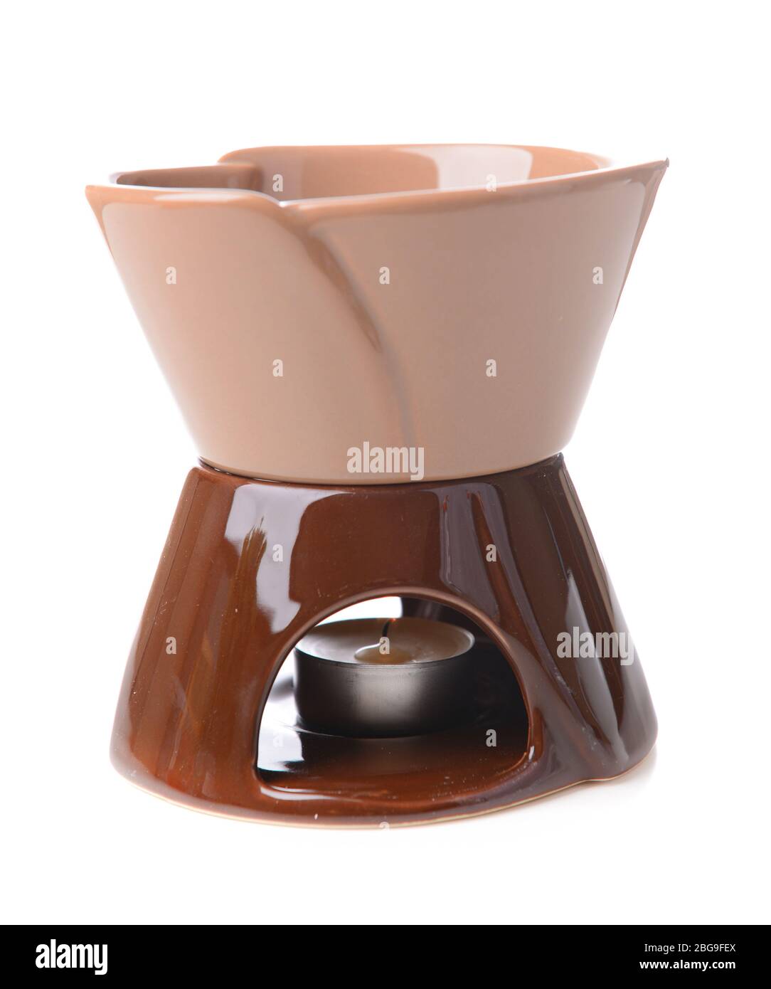 Empty cauldron for chocolate fondue, isolated on white Stock Photo - Alamy