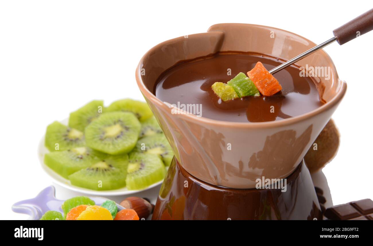 Chocolate fondue with fruits, isolated on white Stock Photo - Alamy