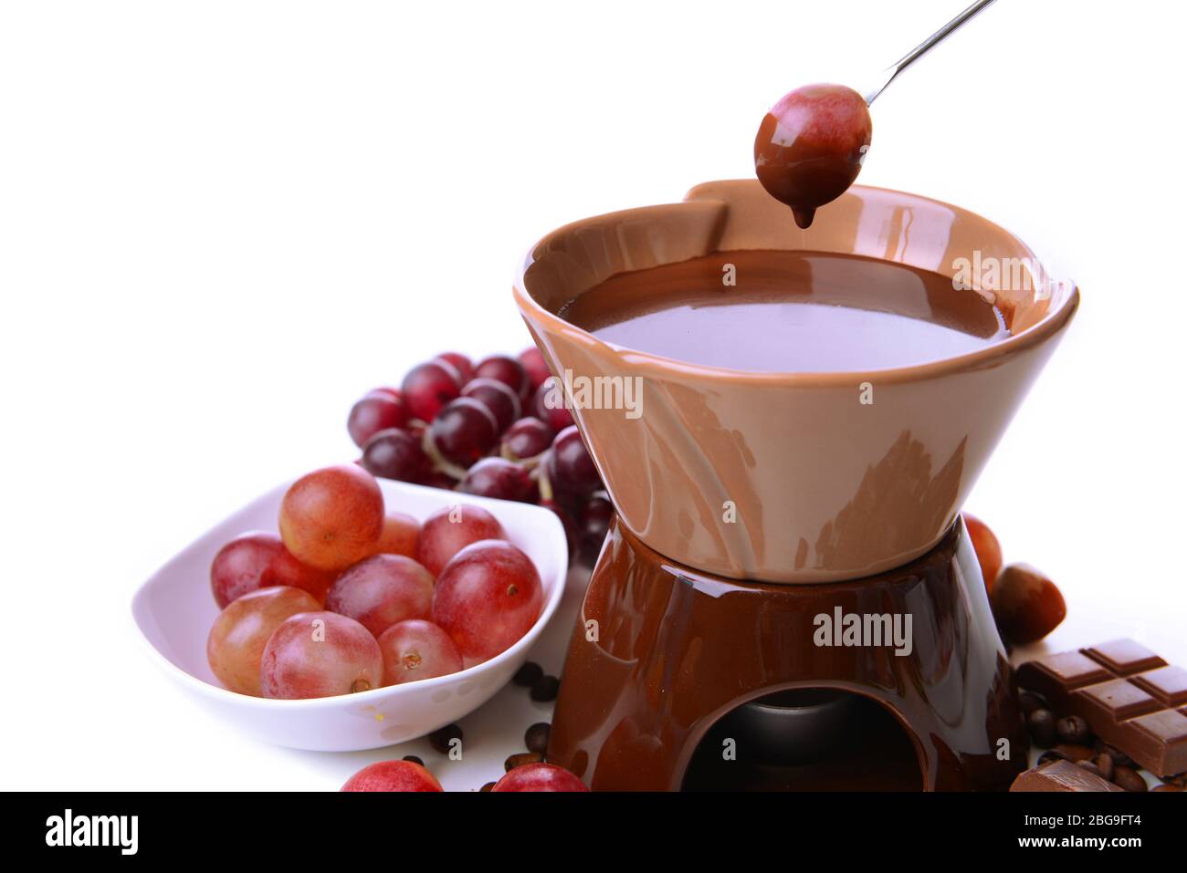 Chocolate fondue with fruits, isolated on white Stock Photo - Alamy