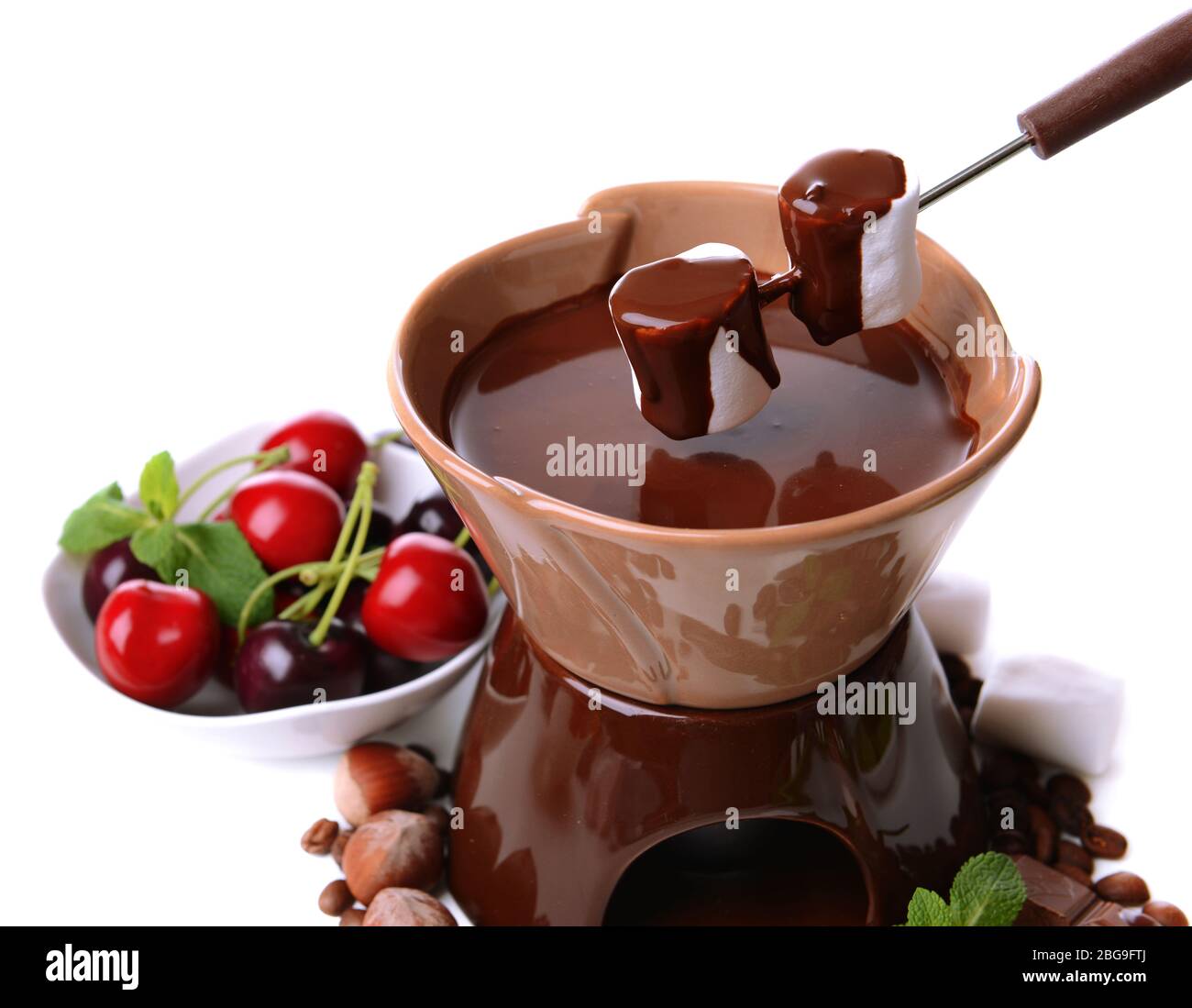 Chocolate fondue with fruits, isolated on white Stock Photo - Alamy