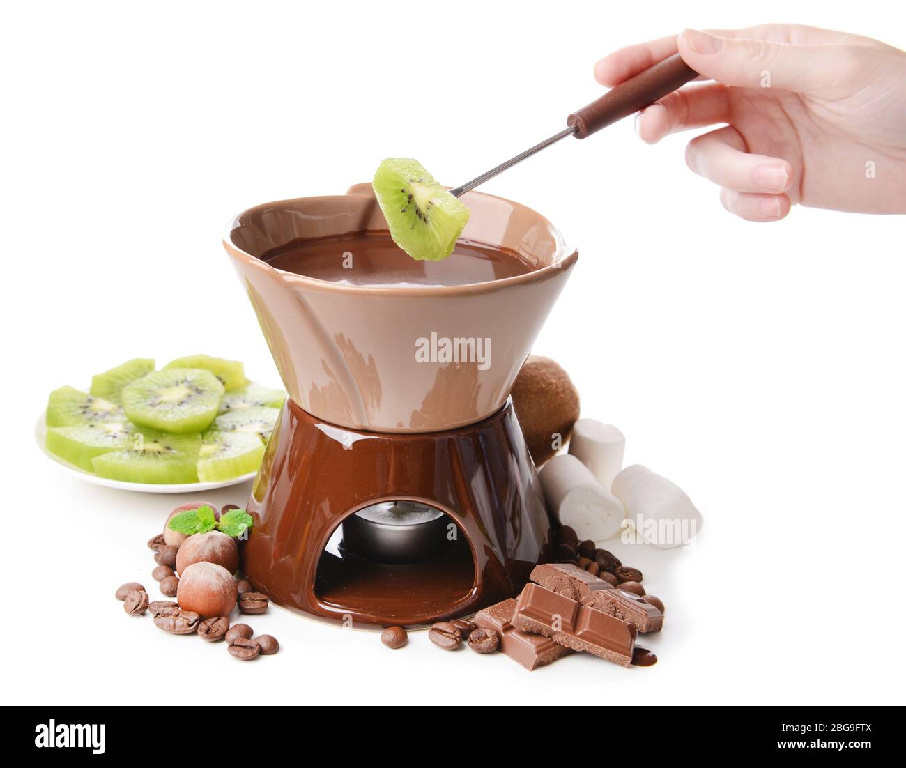 Chocolate fondue with fruits, isolated on white Stock Photo - Alamy