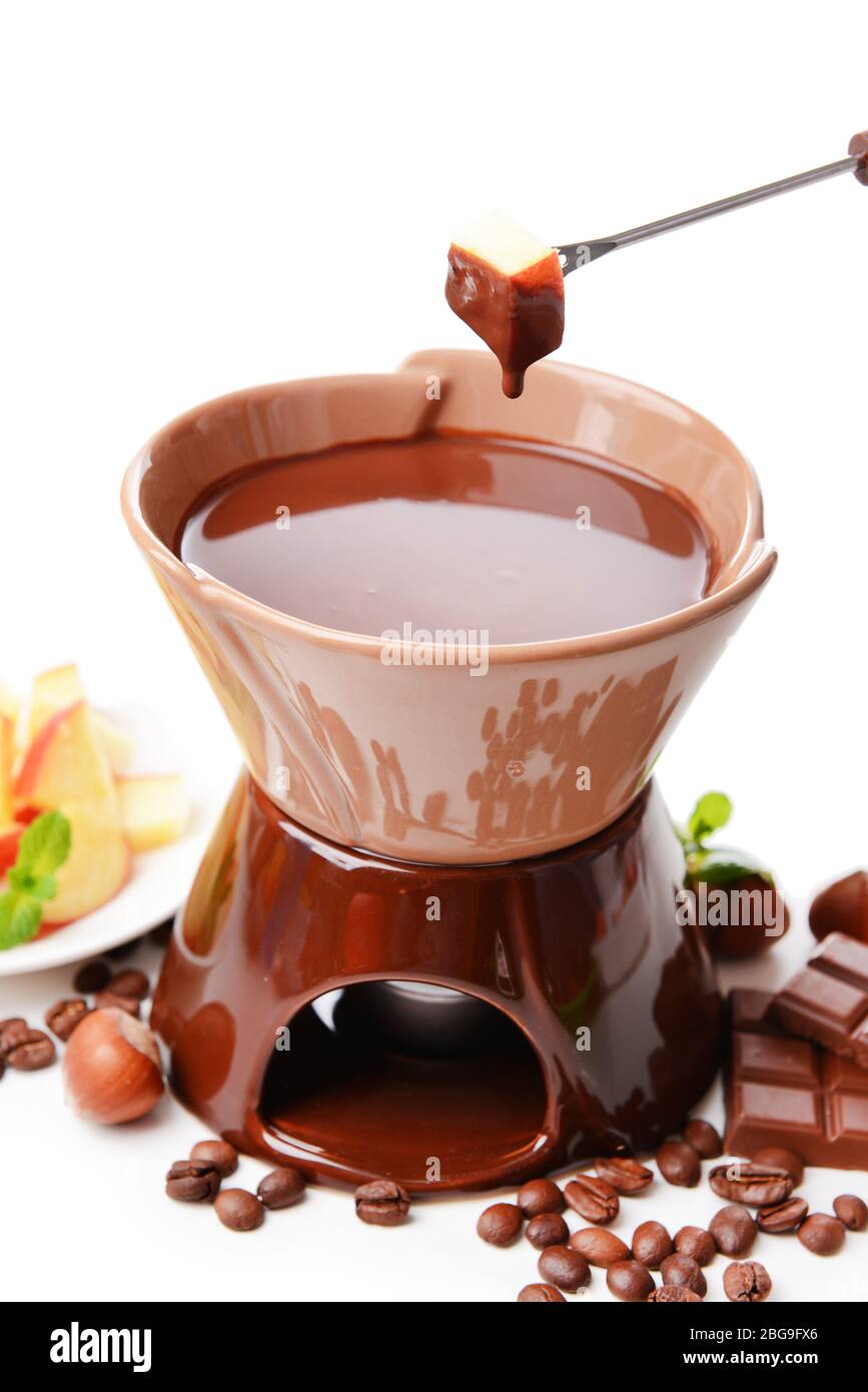 Chocolate fondue with fruits, isolated on white Stock Photo - Alamy