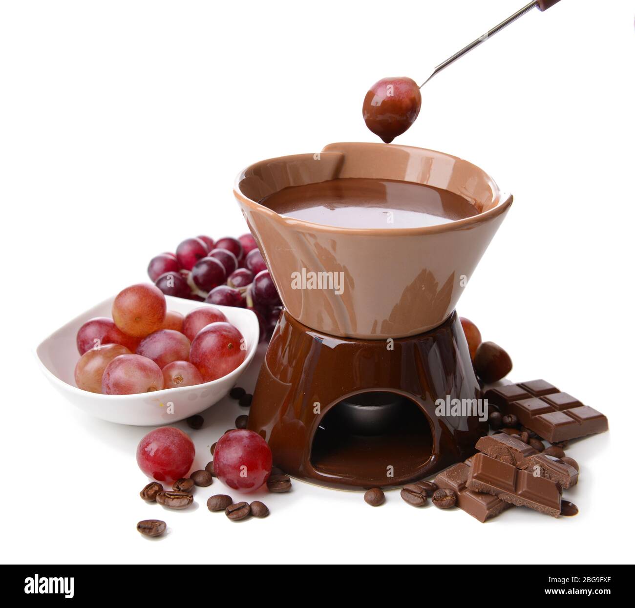 Chocolate fondue with fruits, isolated on white Stock Photo - Alamy