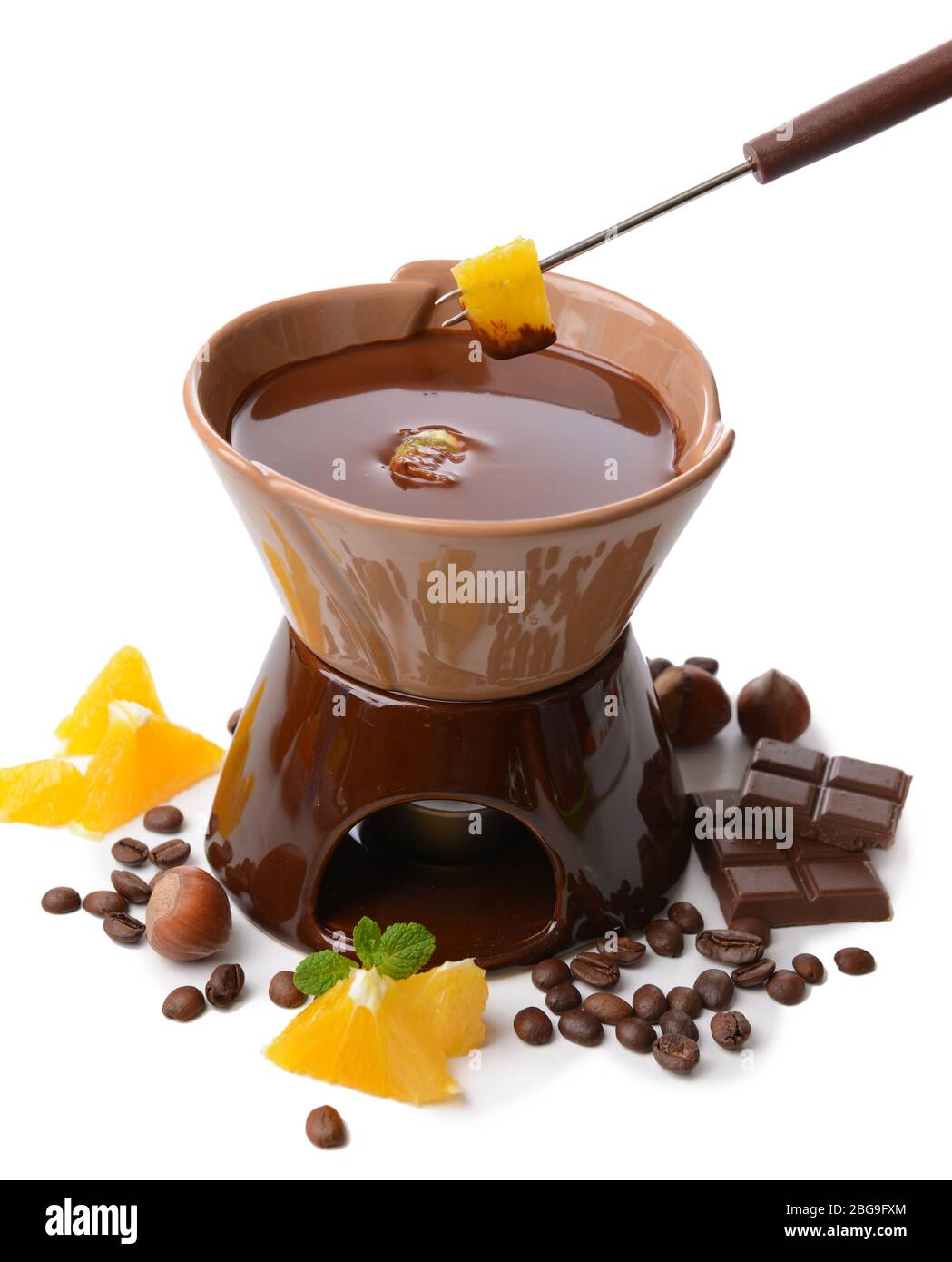 Chocolate fondue with fruits, isolated on white Stock Photo - Alamy