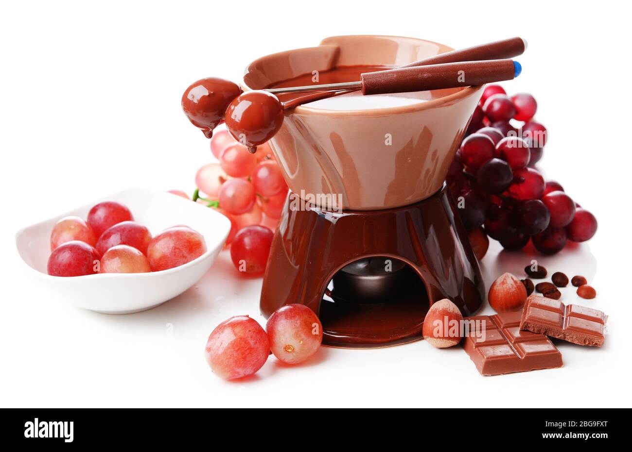Chocolate fondue with fruits, isolated on white Stock Photo - Alamy