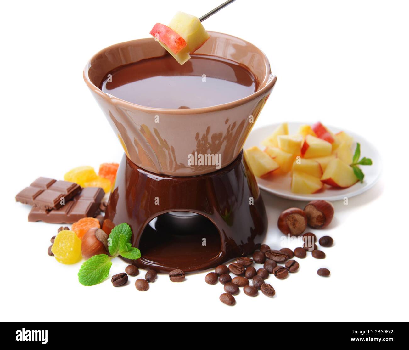 Chocolate fondue with fruits, isolated on white Stock Photo - Alamy