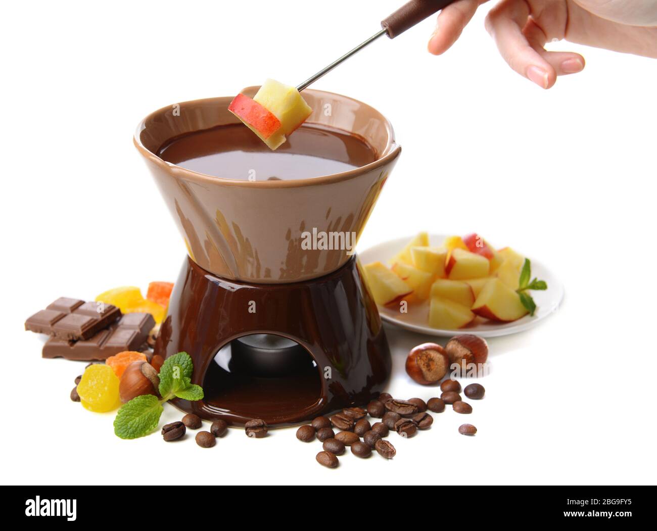 Chocolate fondue with fruits, isolated on white Stock Photo - Alamy