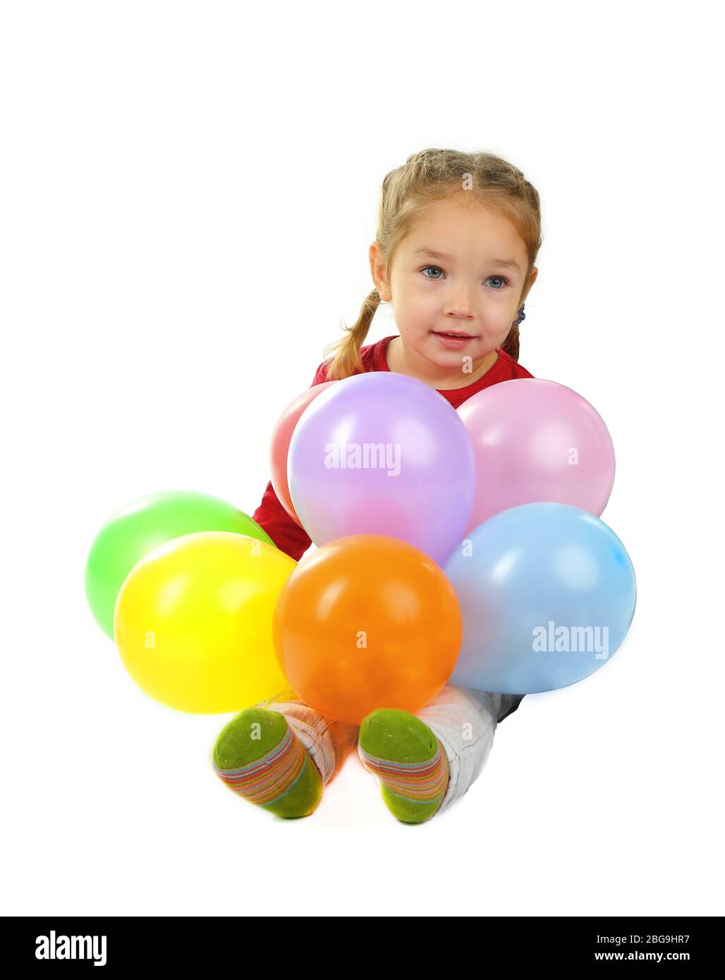 Little girl with colorful balloons isolated on white Stock Photo - Alamy