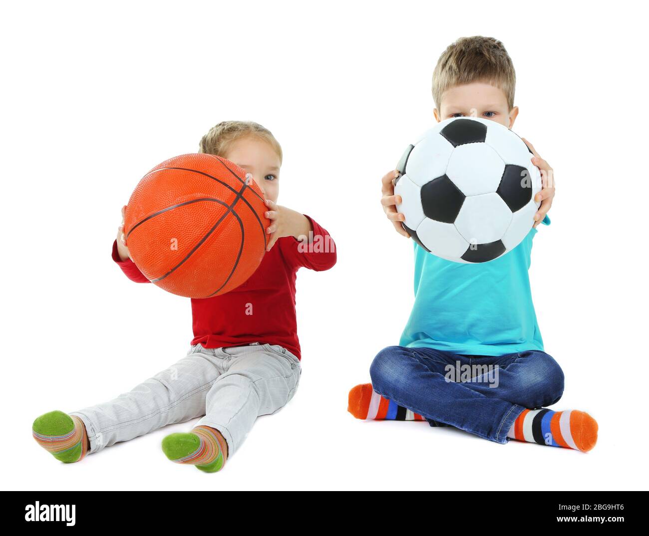 Little children playing with ball isolated on white Stock Photo - Alamy