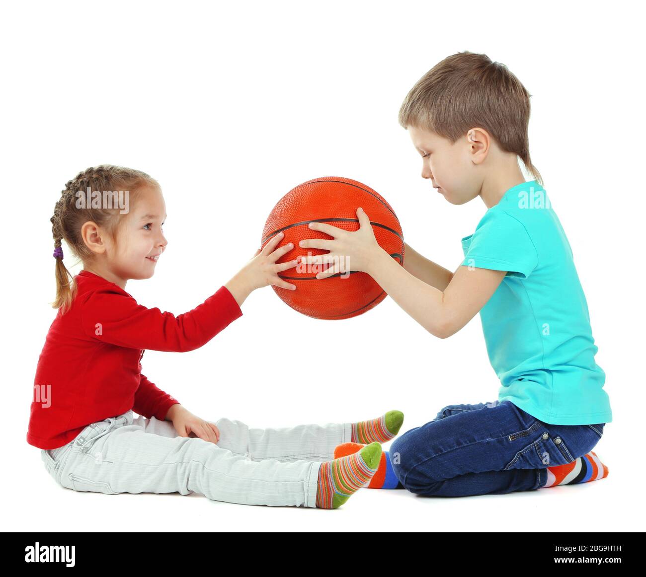 Little children playing with ball isolated on white Stock Photo - Alamy