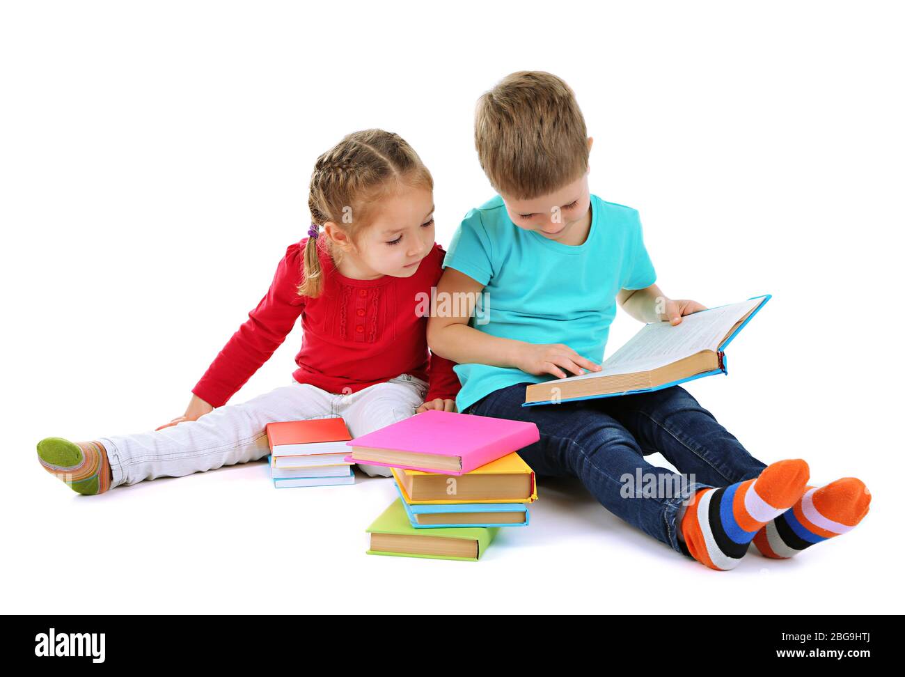 Little children with books isolated on white Stock Photo - Alamy