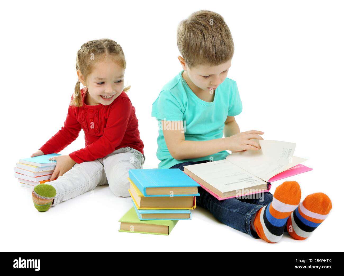 Little children with books isolated on white Stock Photo - Alamy