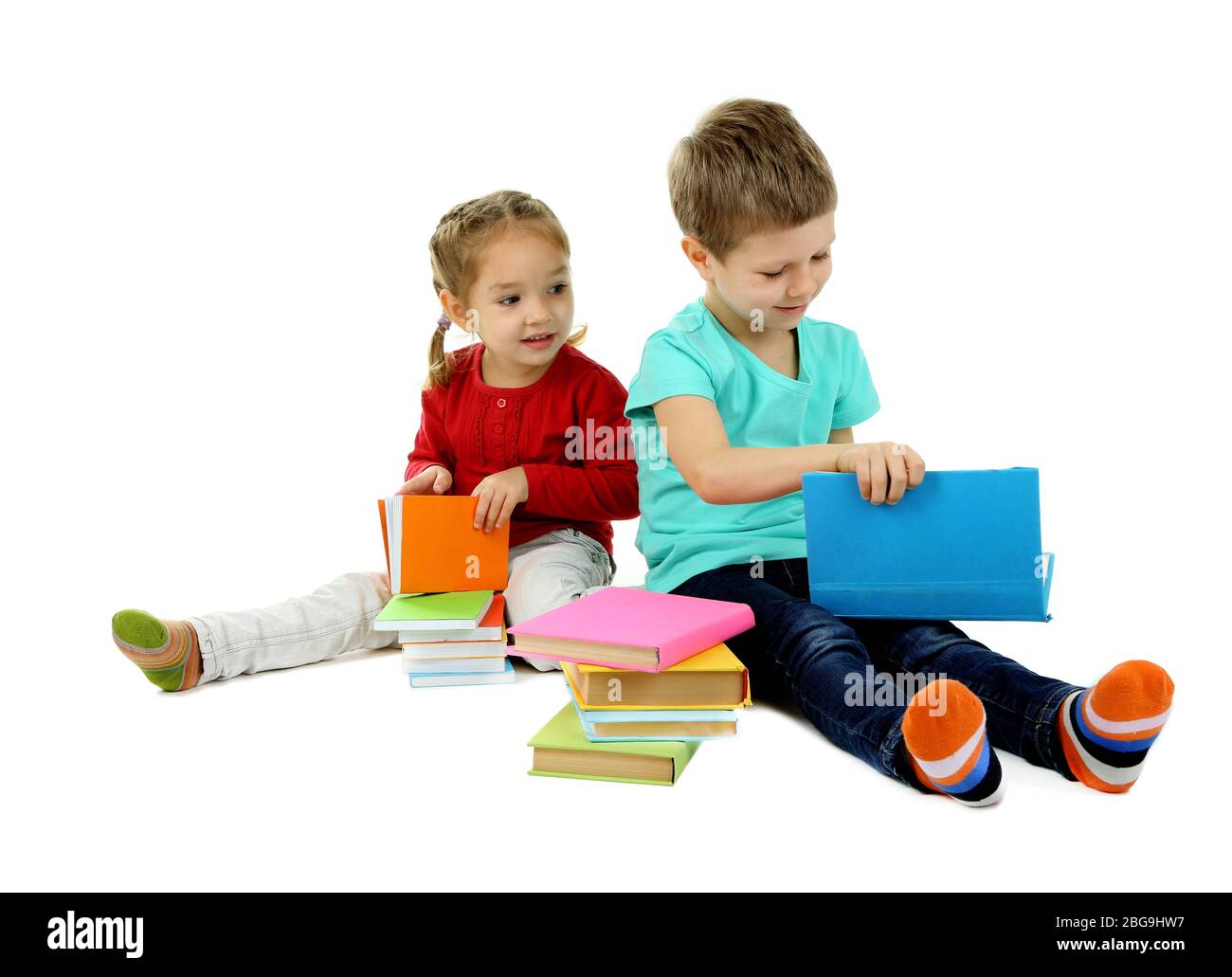 Little children with books isolated on white Stock Photo - Alamy