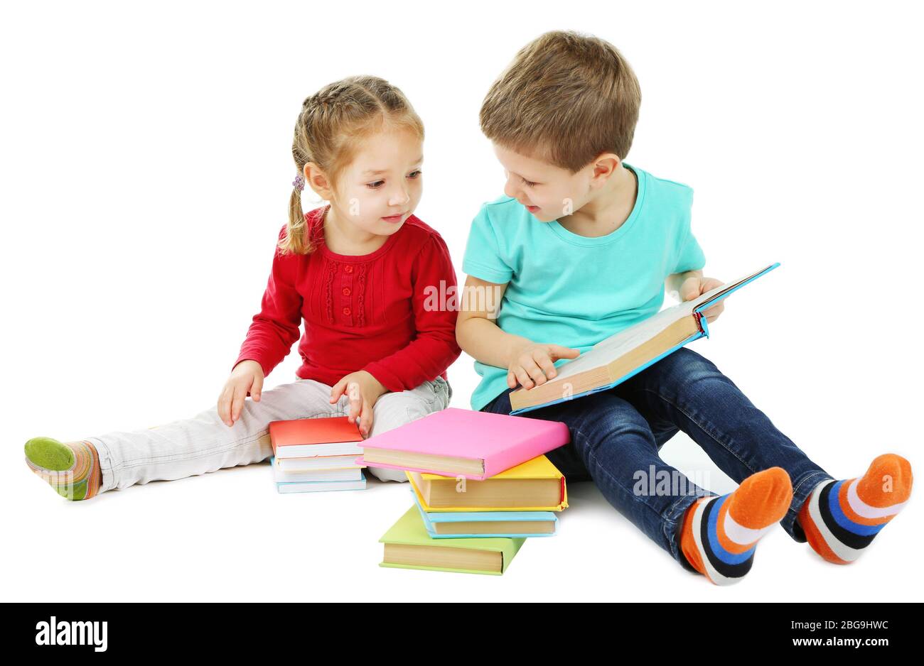 Little children with books isolated on white Stock Photo - Alamy